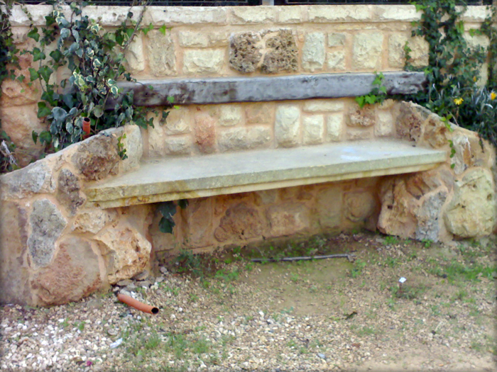 Italian stone cladding with bench, tuff, carparo.